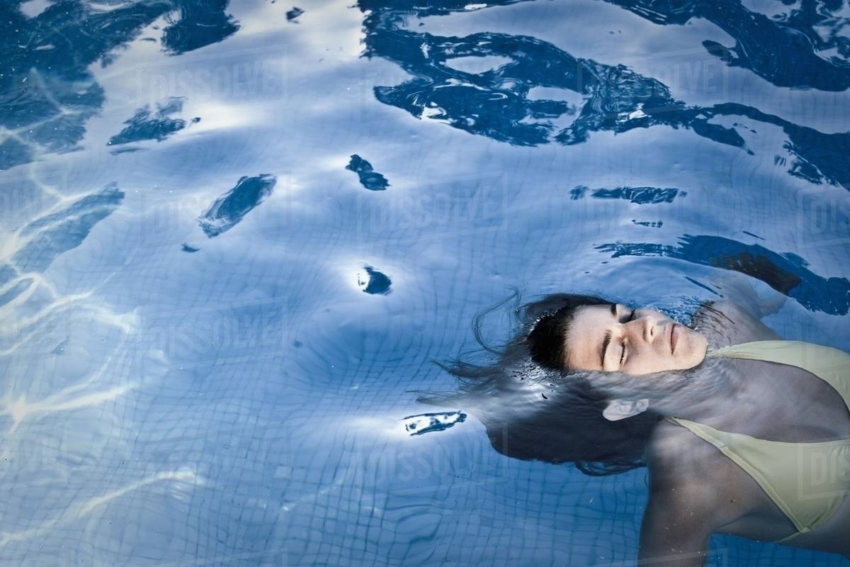 Teen in a pool - Royalty-free Stock Photo | Dissolve