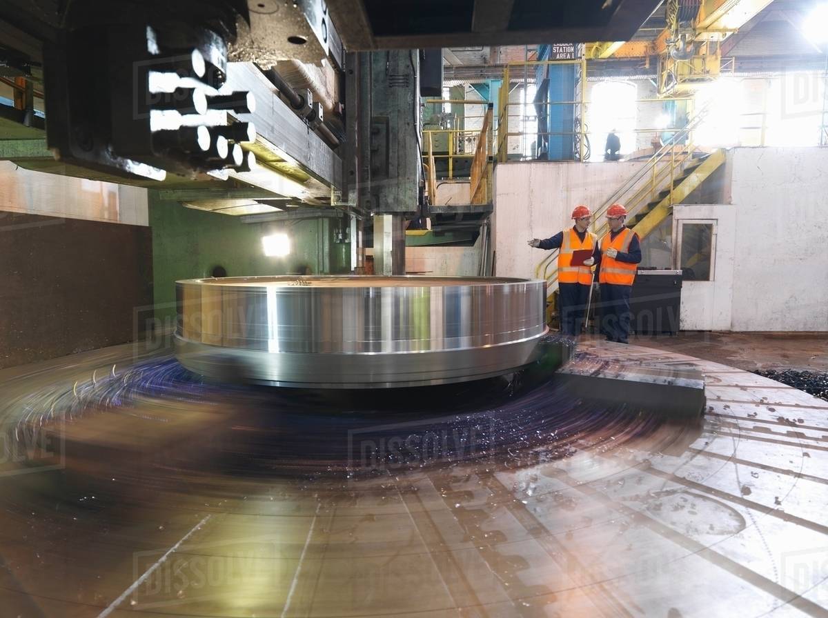 Steel Engineers With Lathe - Stock Photo - Dissolve