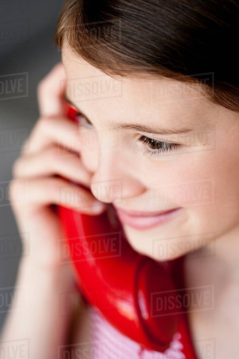 Girl phoning close-up - Stock Photo - Dissolve