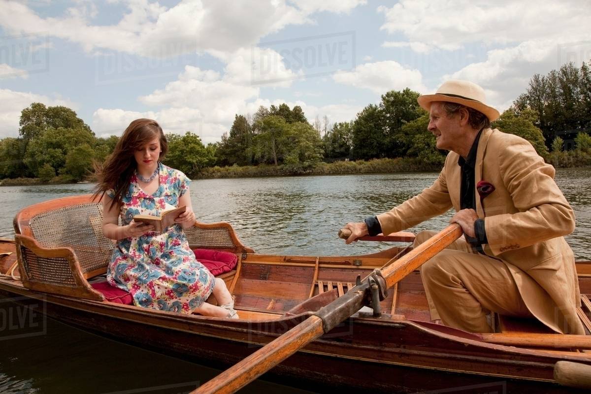 Father and daughter on a vintage boat - Royalty-free Stock Photo | Dissolve