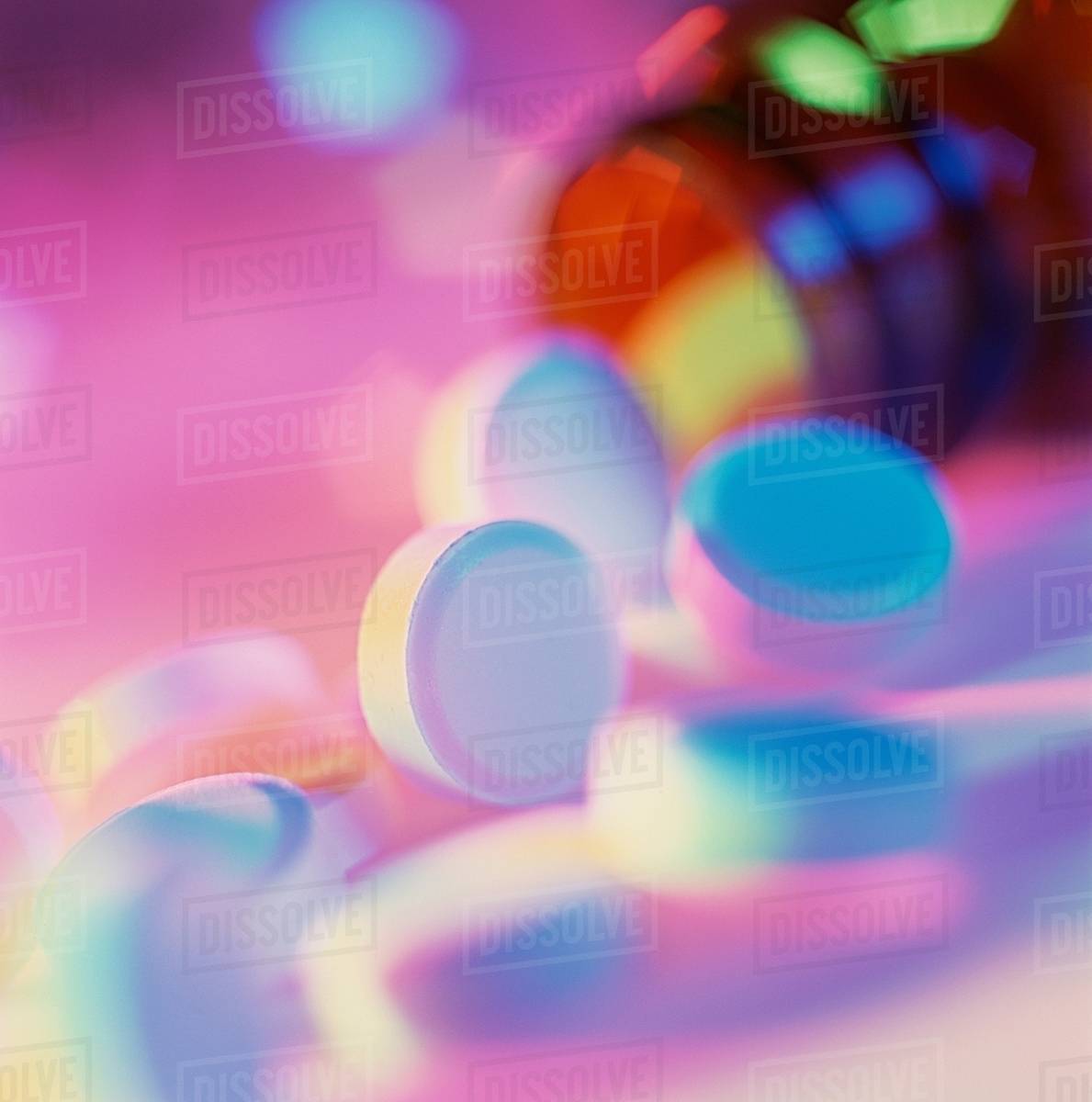 Pain killer pills spilling out of a bottle - Royalty-free Stock Photo ...