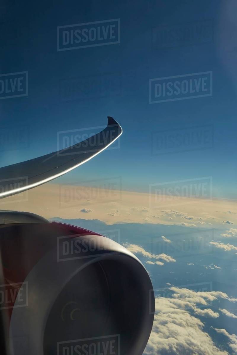 View through airplane window of wing and engine - Royalty-free Stock ...