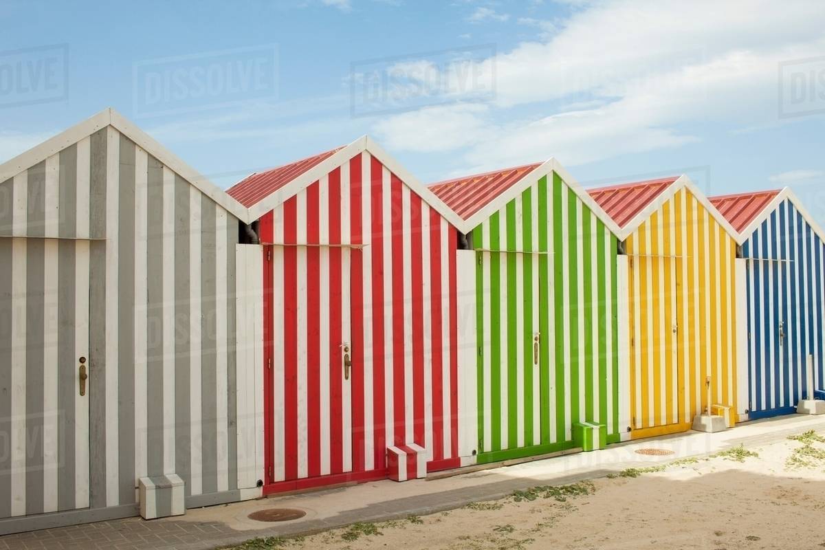 Colorful huts on beach - Royalty-free Stock Photo | Dissolve