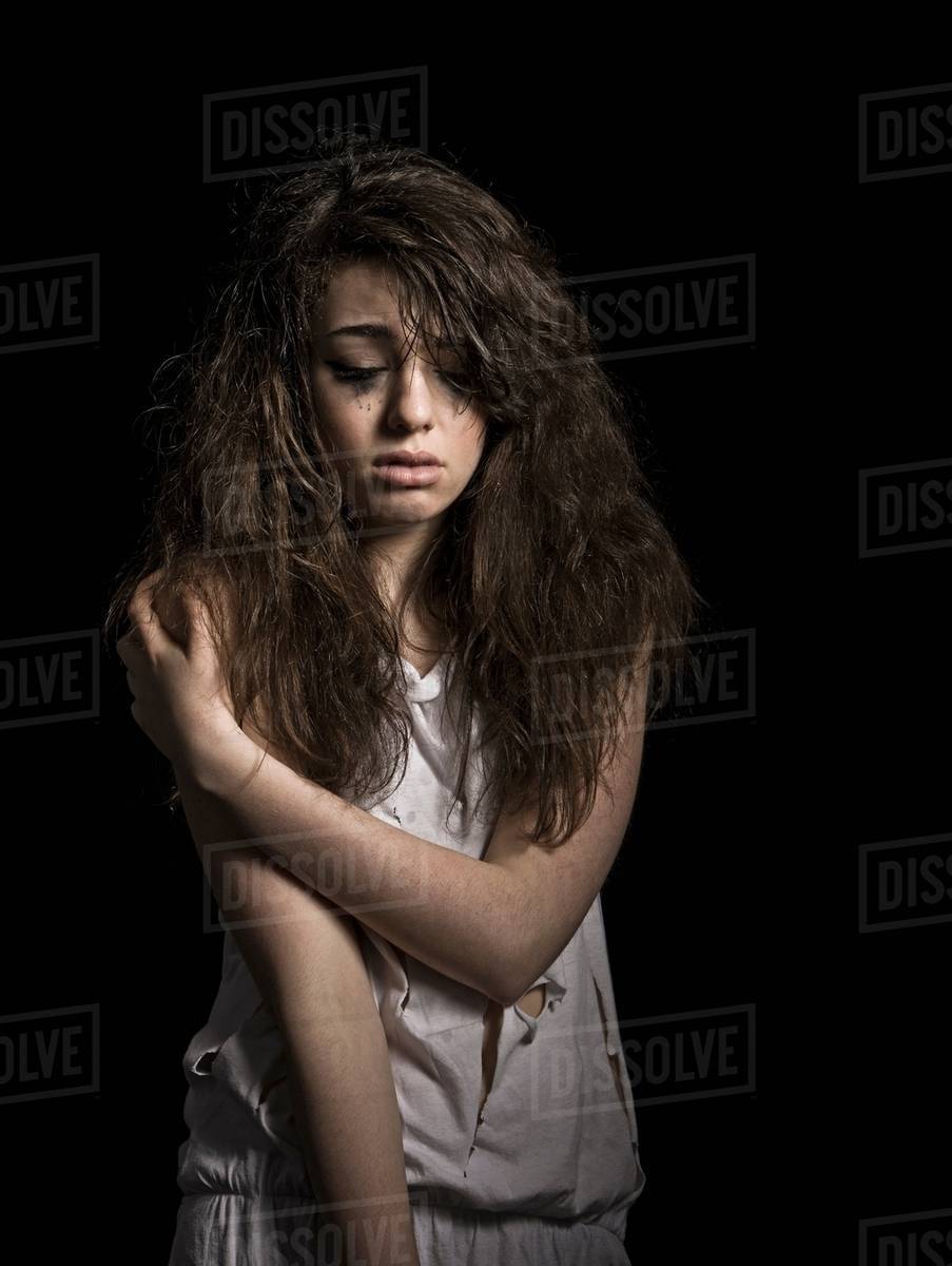 Crying girl with messy hair - Stock Photo - Dissolve