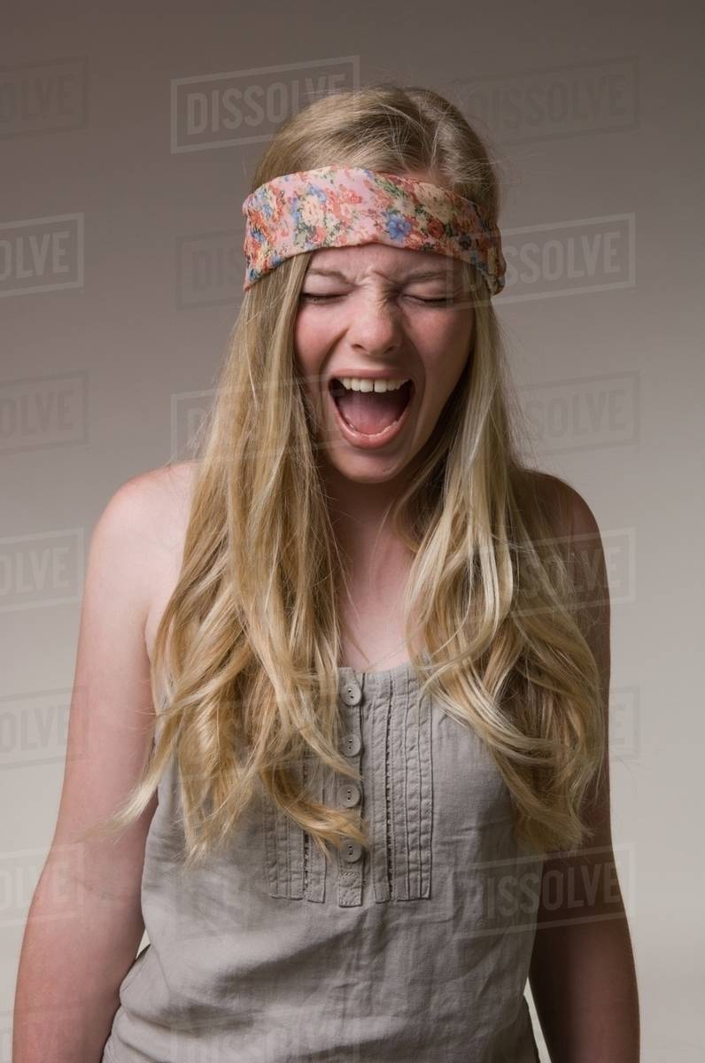 Teenage girl yelling - Royalty-free Stock Photo | Dissolve