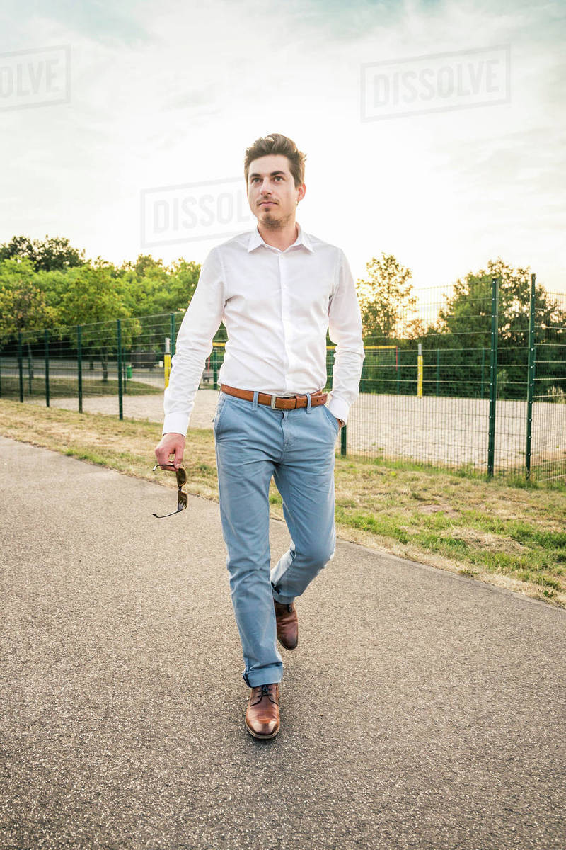 Portrait of smart young man - Royalty-free Stock Photo | Dissolve