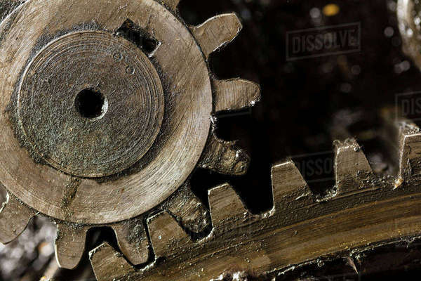 Close up of printing machinery cogs in printing press workshop ...