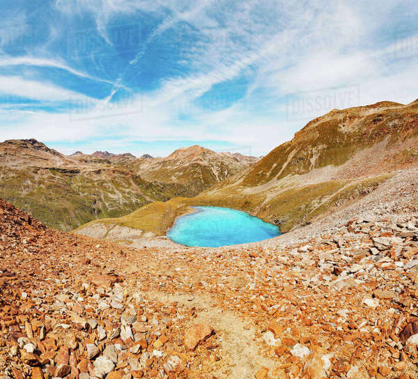 Elevated view of lake in mountains - Stock Photo - Dissolve