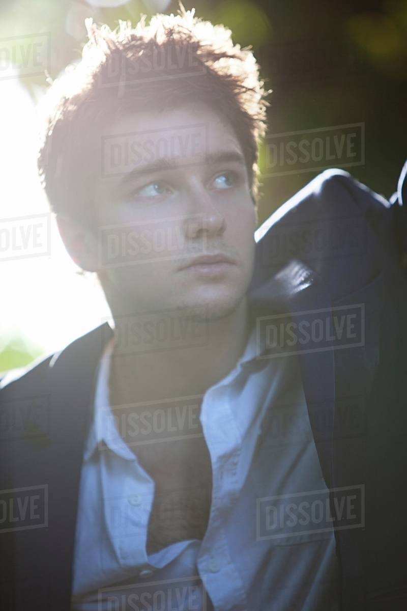 Close up of man standing outdoors - Royalty-free Stock Photo | Dissolve