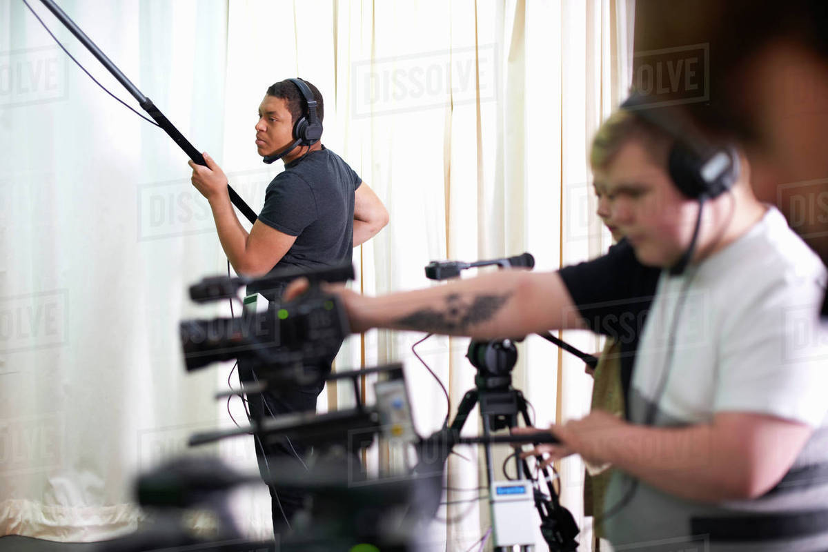 College students filming and recording in TV studio - Royalty-free ...