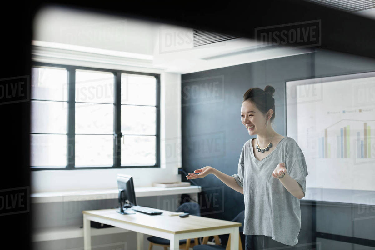 Lecturer delivering lesson in class - Royalty-free Stock Photo | Dissolve