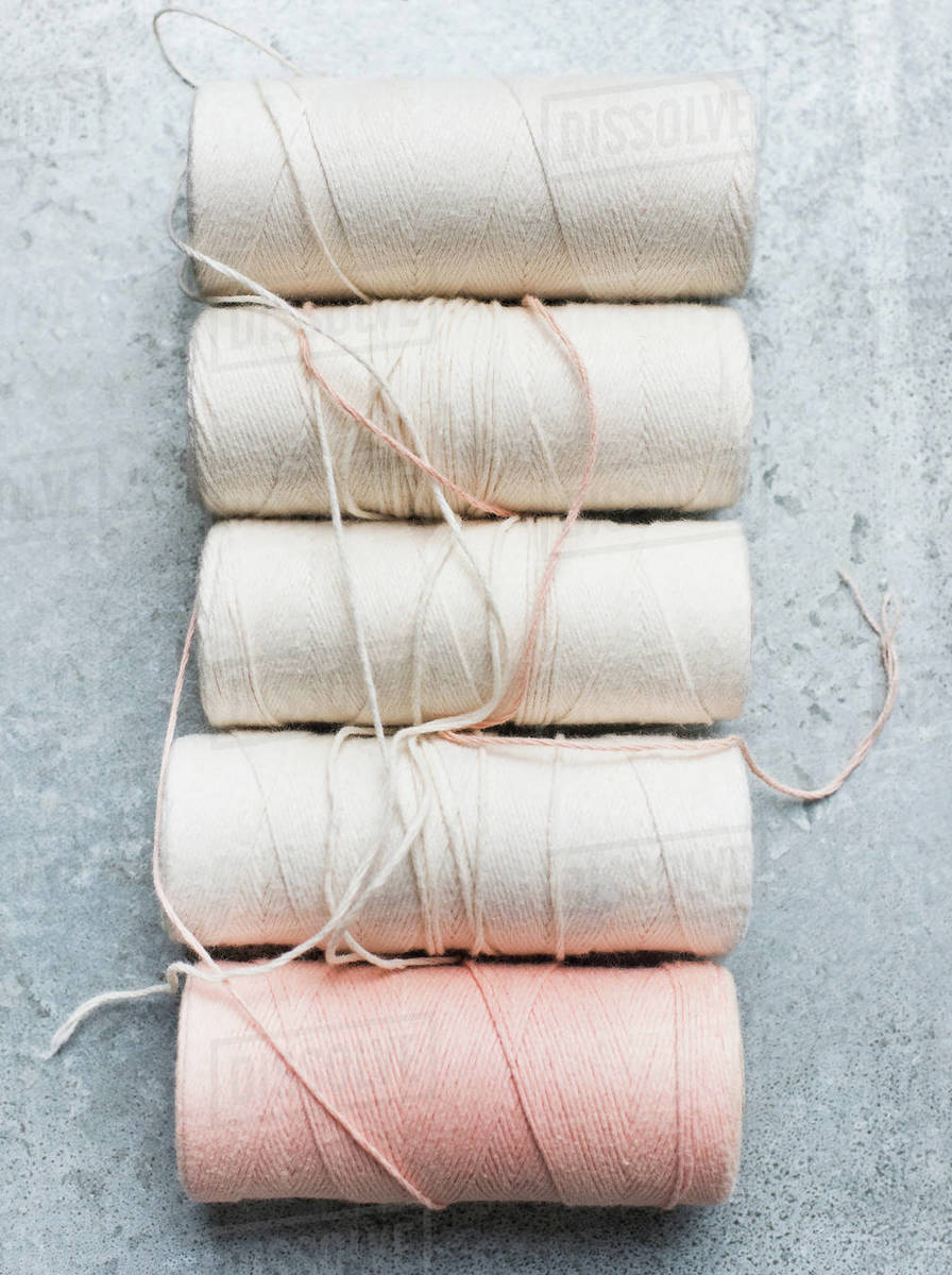 Still life with row of yarn spools, overhead view - Royalty-free Stock ...