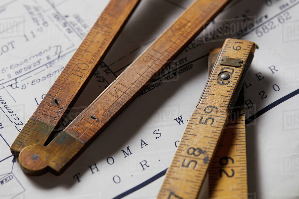 Vintage rulers on property map, close up - Royalty-free Stock Photo ...