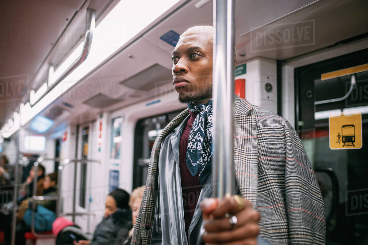 Stylish man daydreaming in train, Milan, Italy - Royalty-free Stock ...