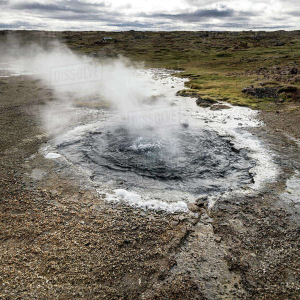 Volcanic spring, view of a natural hot spring and pool of hot water ...