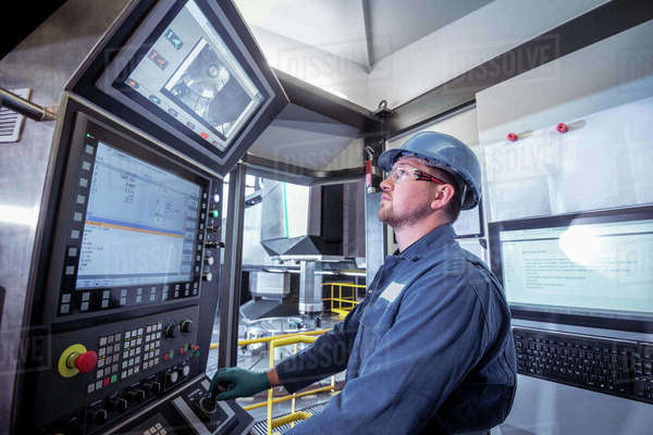 Specialist lathe operator in steelworks - Royalty-free Stock Photo ...