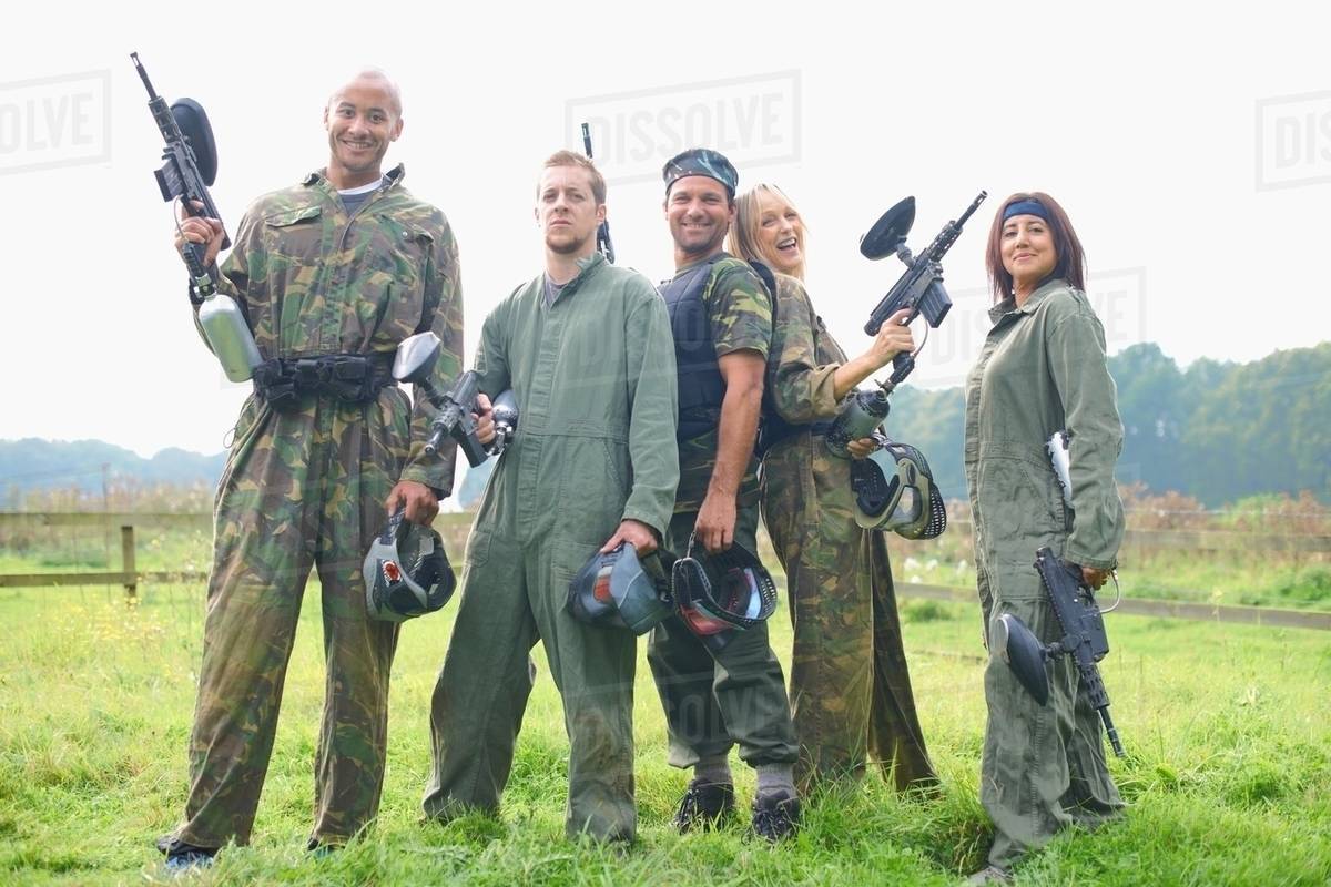 Paintball team in a field - Stock Photo - Dissolve