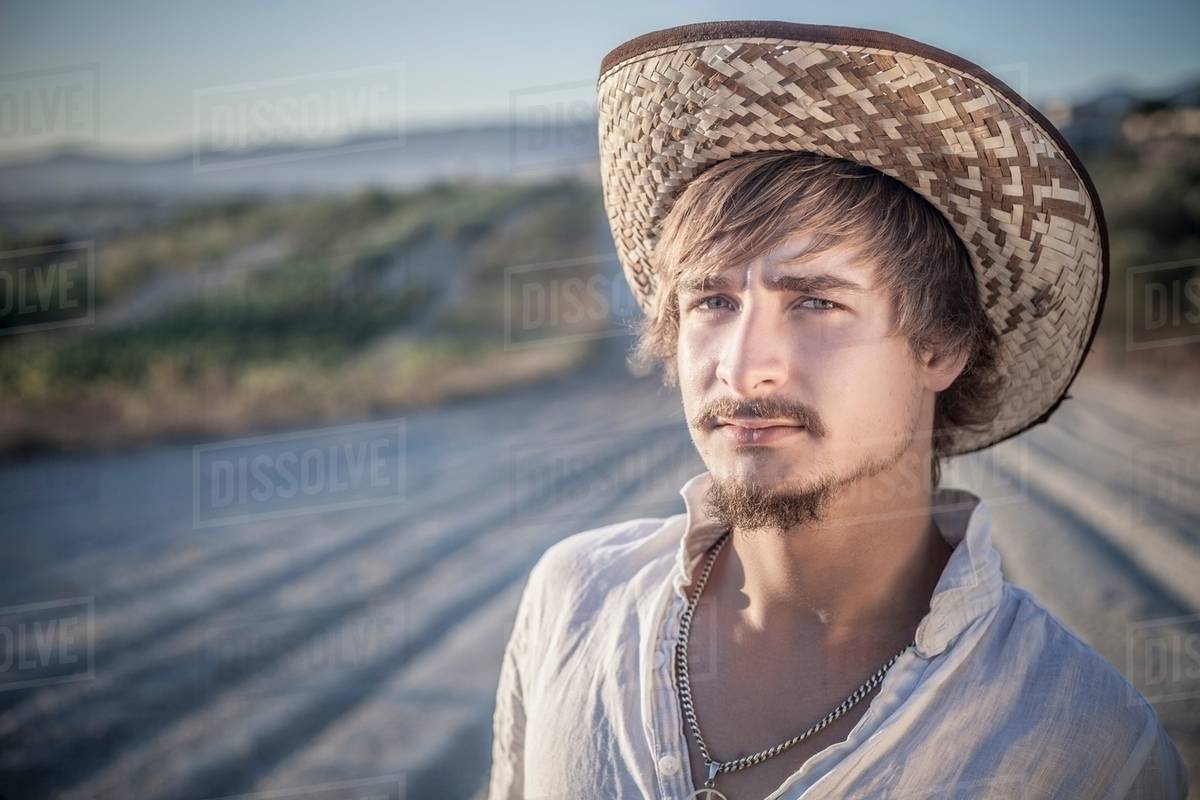 Viticulturist working in vineyard, Cagliari, Sardinia, Italy - Stock Photo - Dissolve