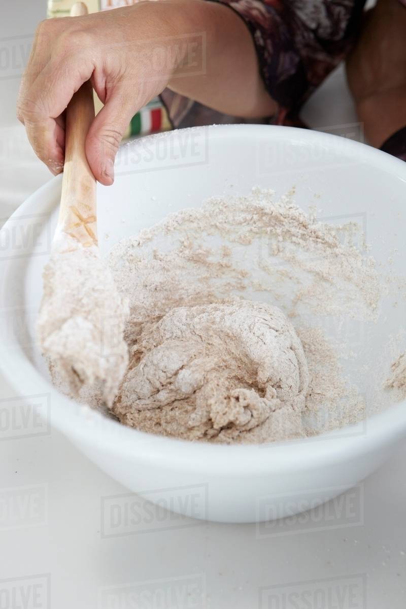 Close up of boy stirring dough in bowl - Royalty-free Stock Photo ...