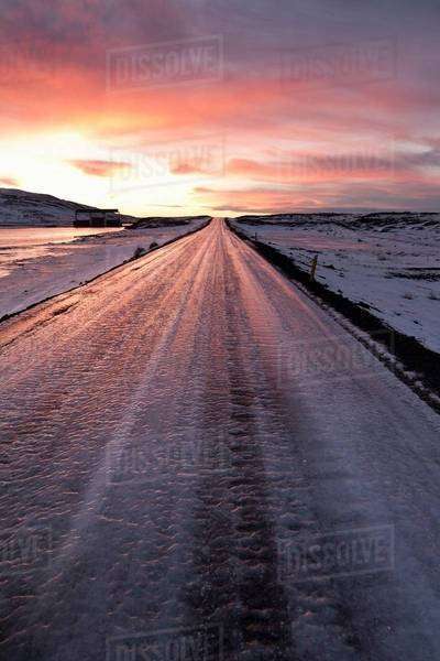 Frozen road in snowy landscape - Royalty-free Stock Photo | Dissolve