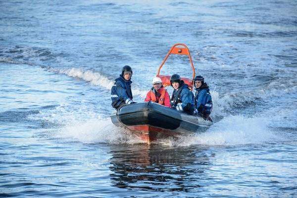 Rescue boat training at nautical training facility - Stock Photo - Dissolve