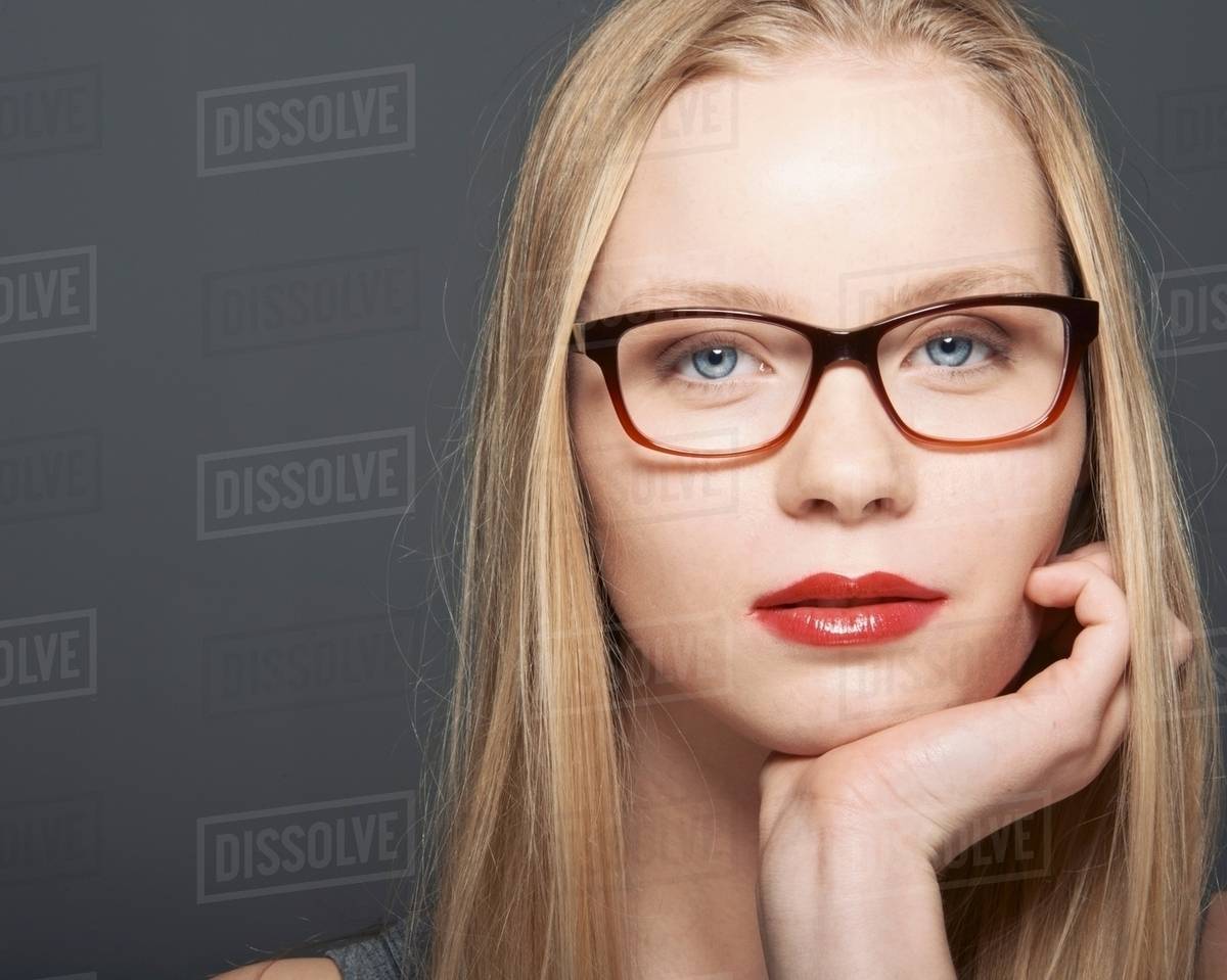 Close up of womans serious face - Royalty-free Stock Photo | Dissolve