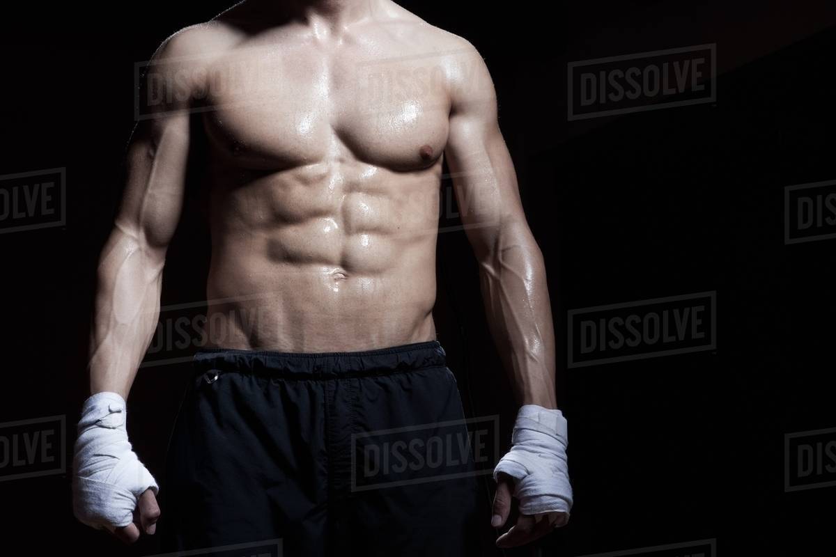 Muscular torso of boxer - Stock Photo - Dissolve
