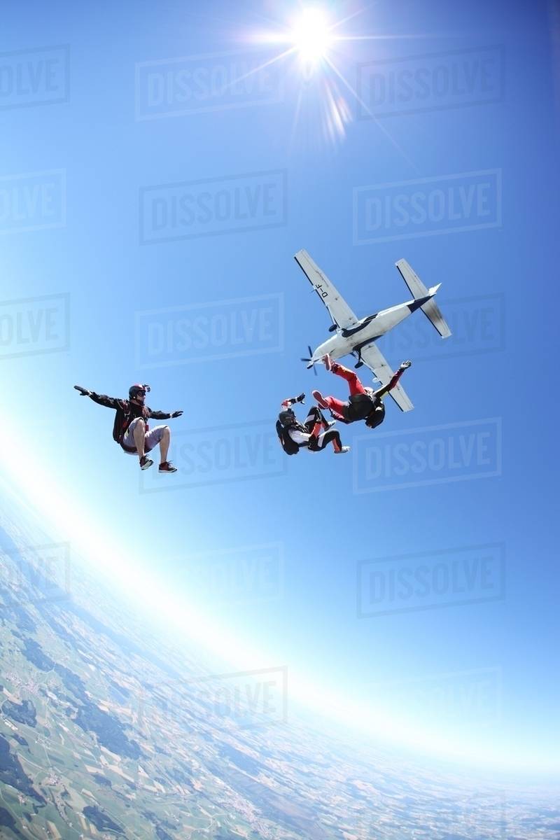 Skydivers free falling above Leutkirch, Bavaria, Germany - Royalty-free ...