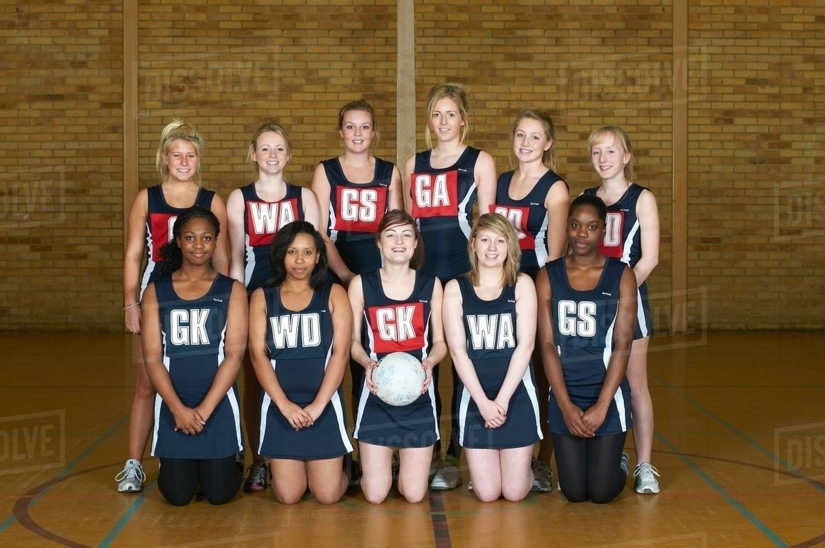 Portrait of netball team - Royalty-free Stock Photo | Dissolve