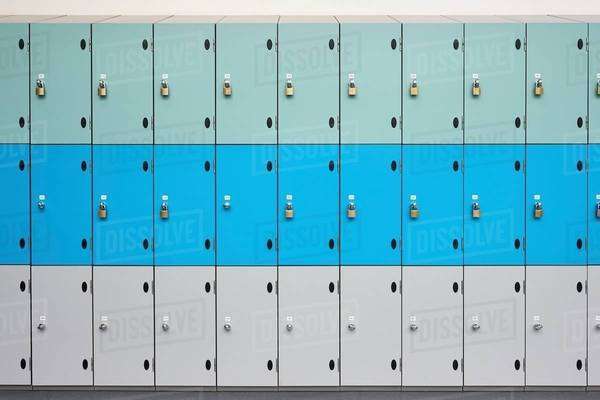 Rows of school lockers with doors closed - Stock Photo - Dissolve