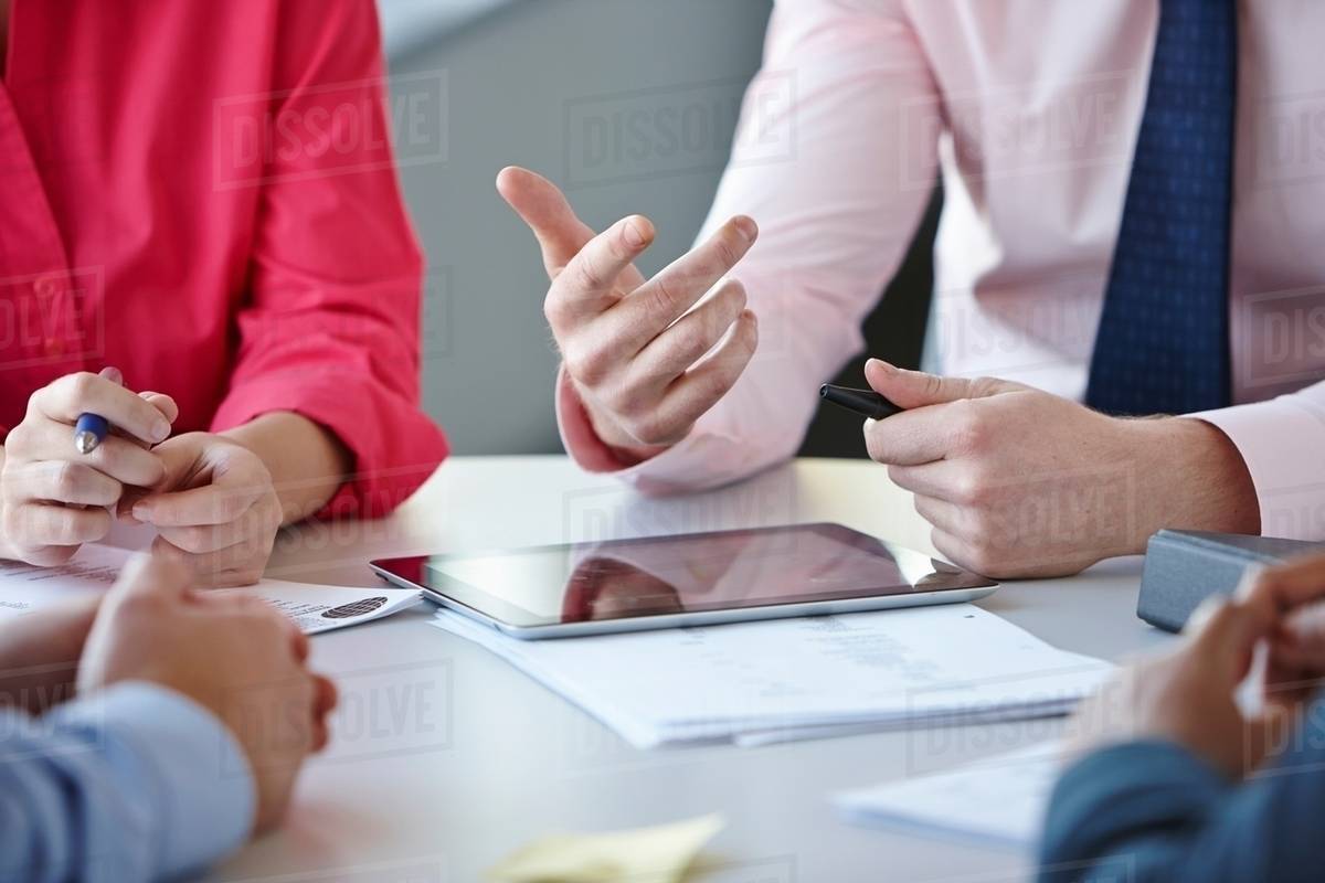 Business colleagues in meeting - Stock Photo - Dissolve