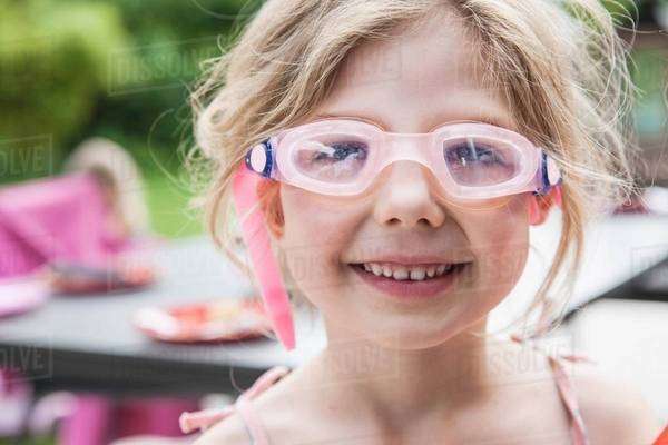 Girl wearing goggles - Stock Photo - Dissolve