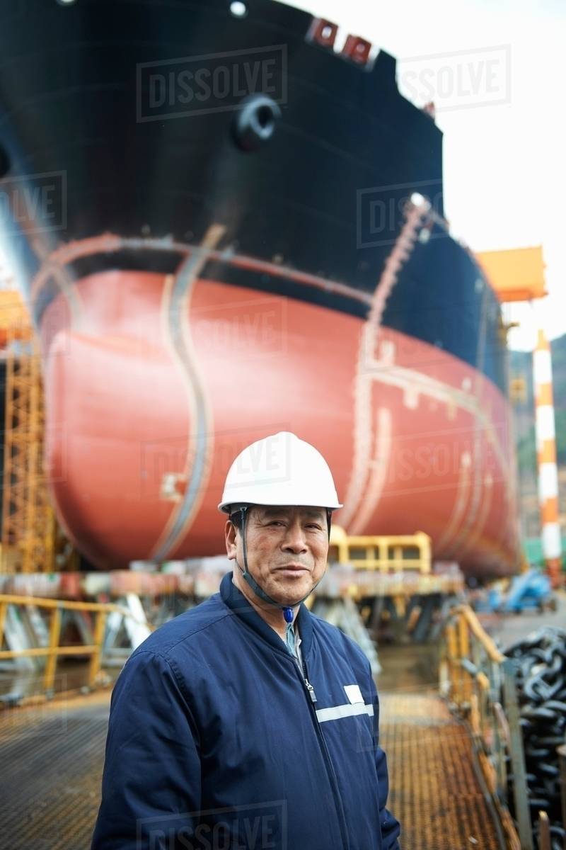 Portrait of male worker at shipyard, GoSeong-gun, South Korea - Royalty ...