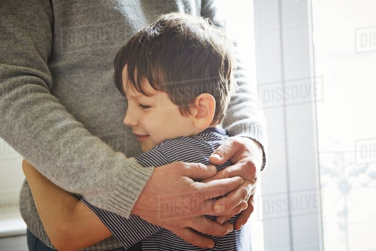 Father and son hugging - Royalty-free Stock Photo | Dissolve