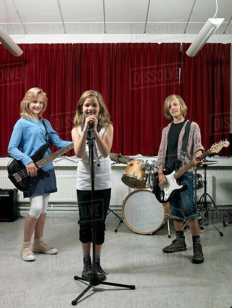 Three kids in a band - Royalty-free Stock Photo | Dissolve