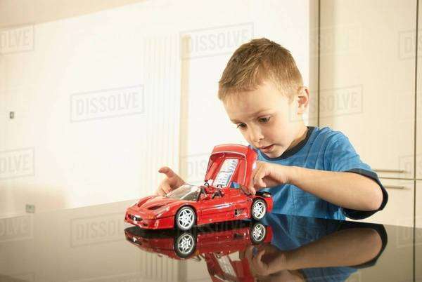 Boy with car - Royalty-free Stock Photo | Dissolve