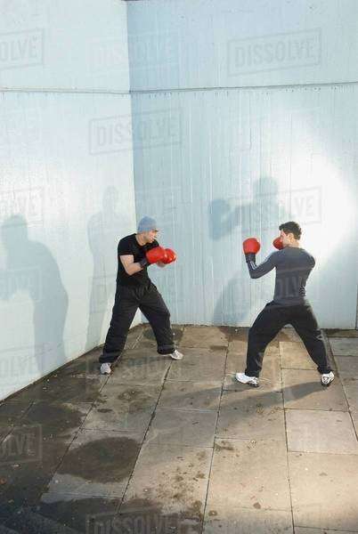 Two men sparing - Stock Photo - Dissolve