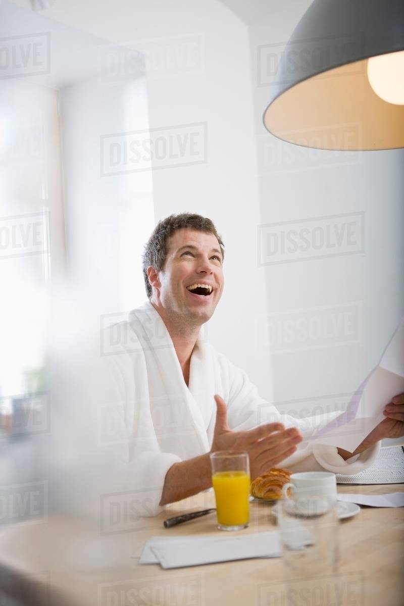 Man getting good news - Stock Photo - Dissolve