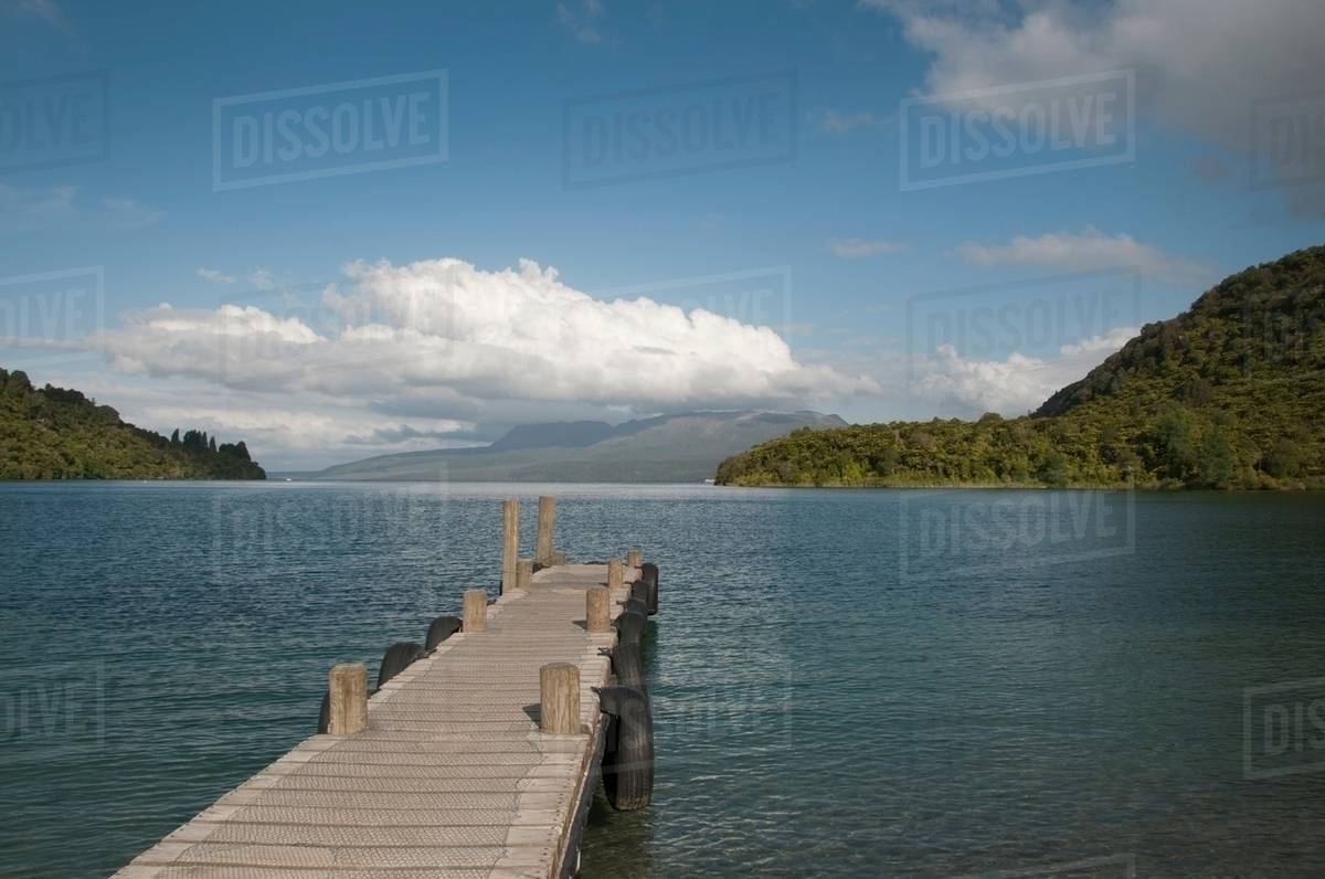 Wooden jetty over lake - Royalty-free Stock Photo | Dissolve