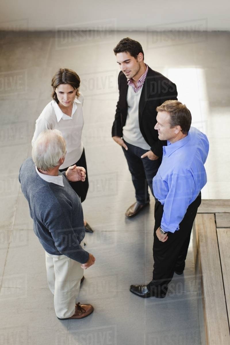 Overhead view of business people talking - Royalty-free Stock Photo ...