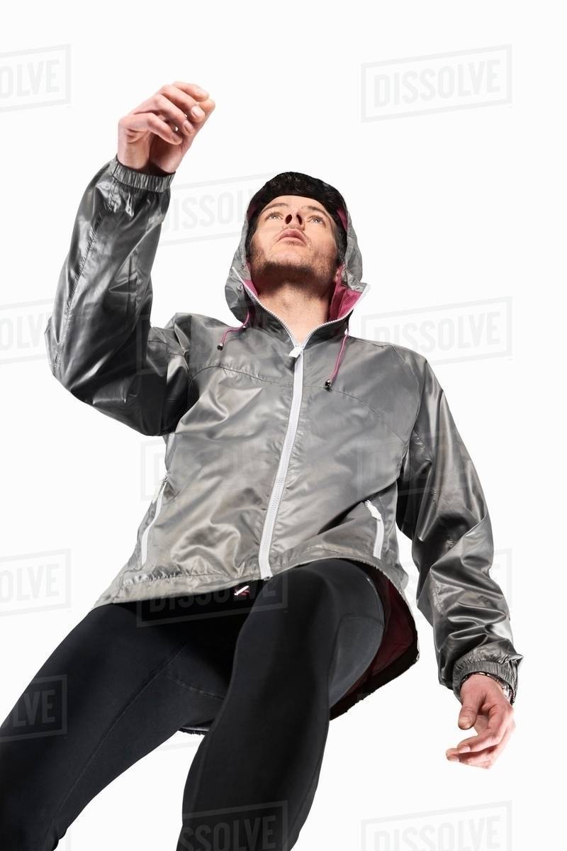 Low angle view of man jogging - Royalty-free Stock Photo | Dissolve