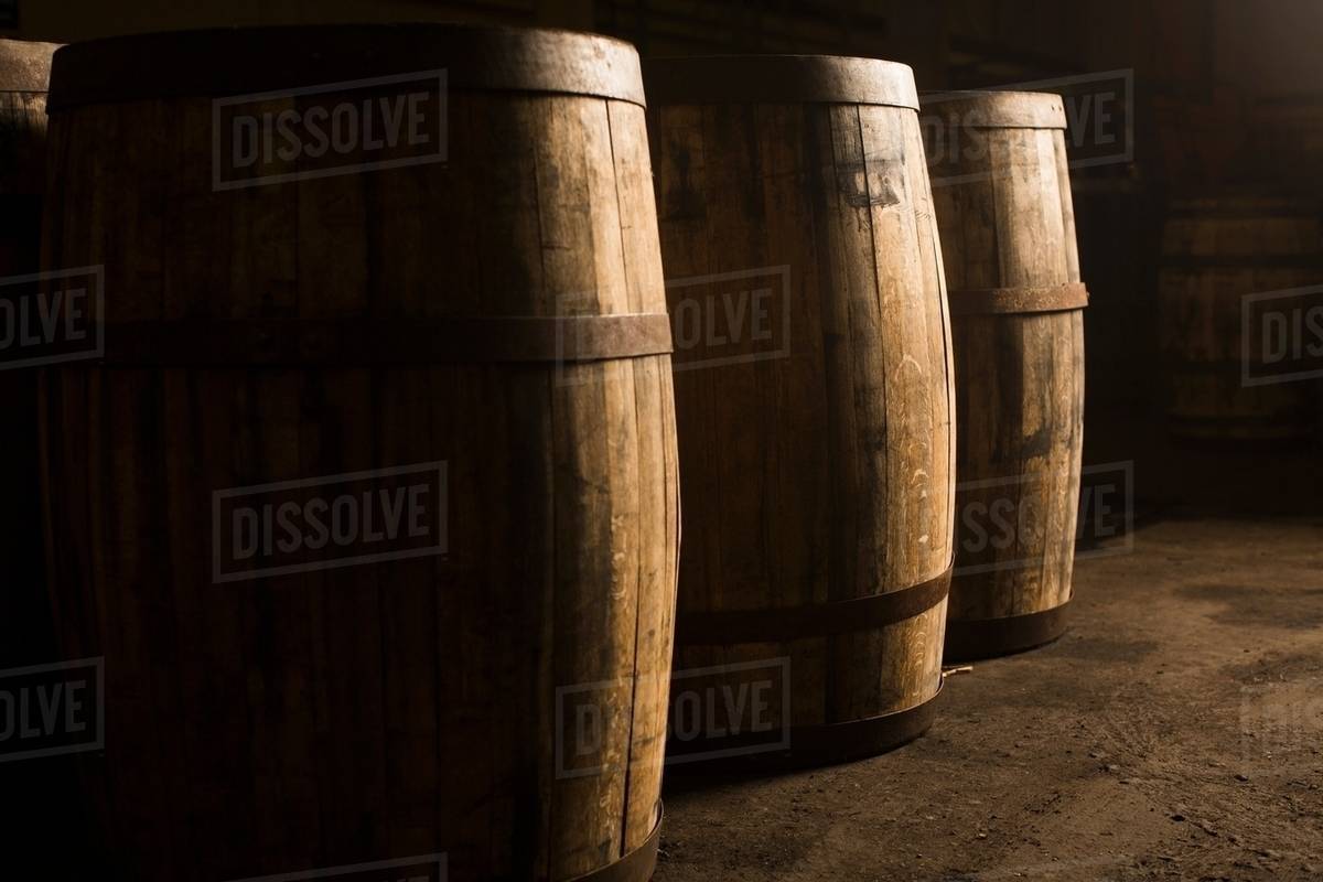 Wooden whisky casks - Royalty-free Stock Photo | Dissolve