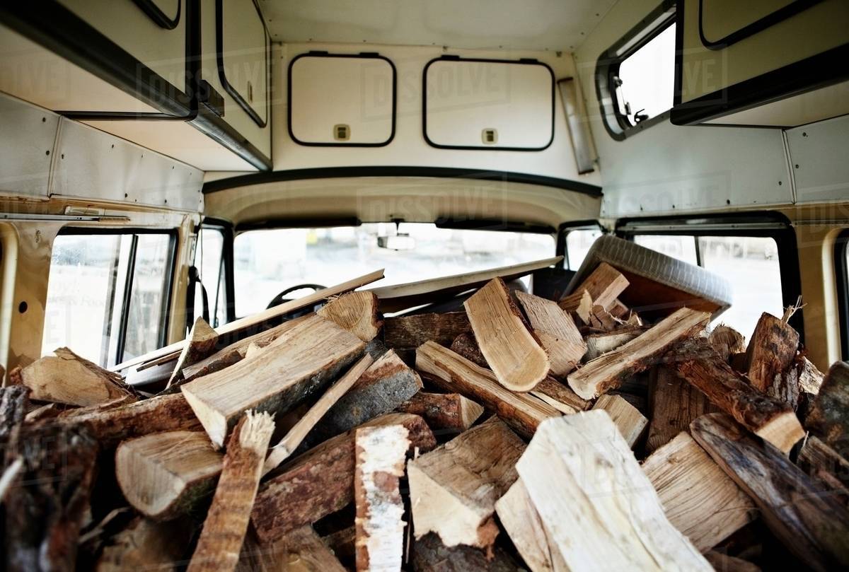 Firewood piled in van - Royalty-free Stock Photo | Dissolve