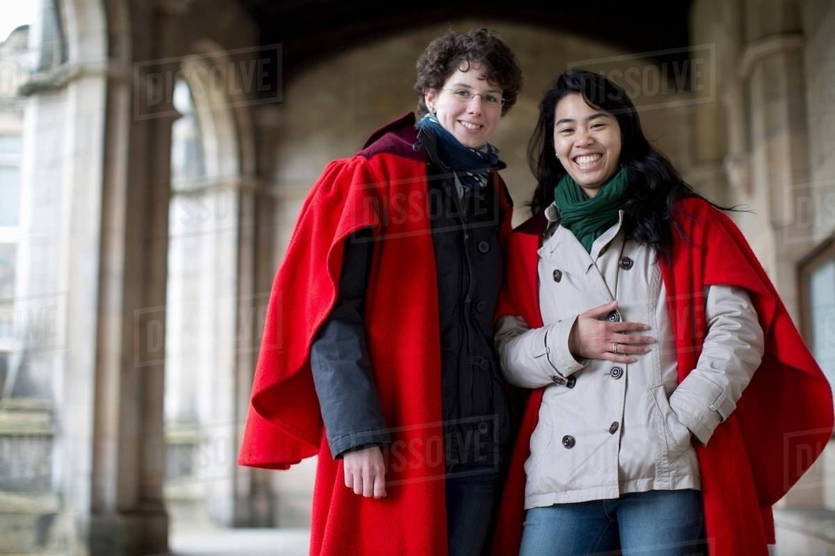 University students in traditional capes - Stock Photo - Dissolve