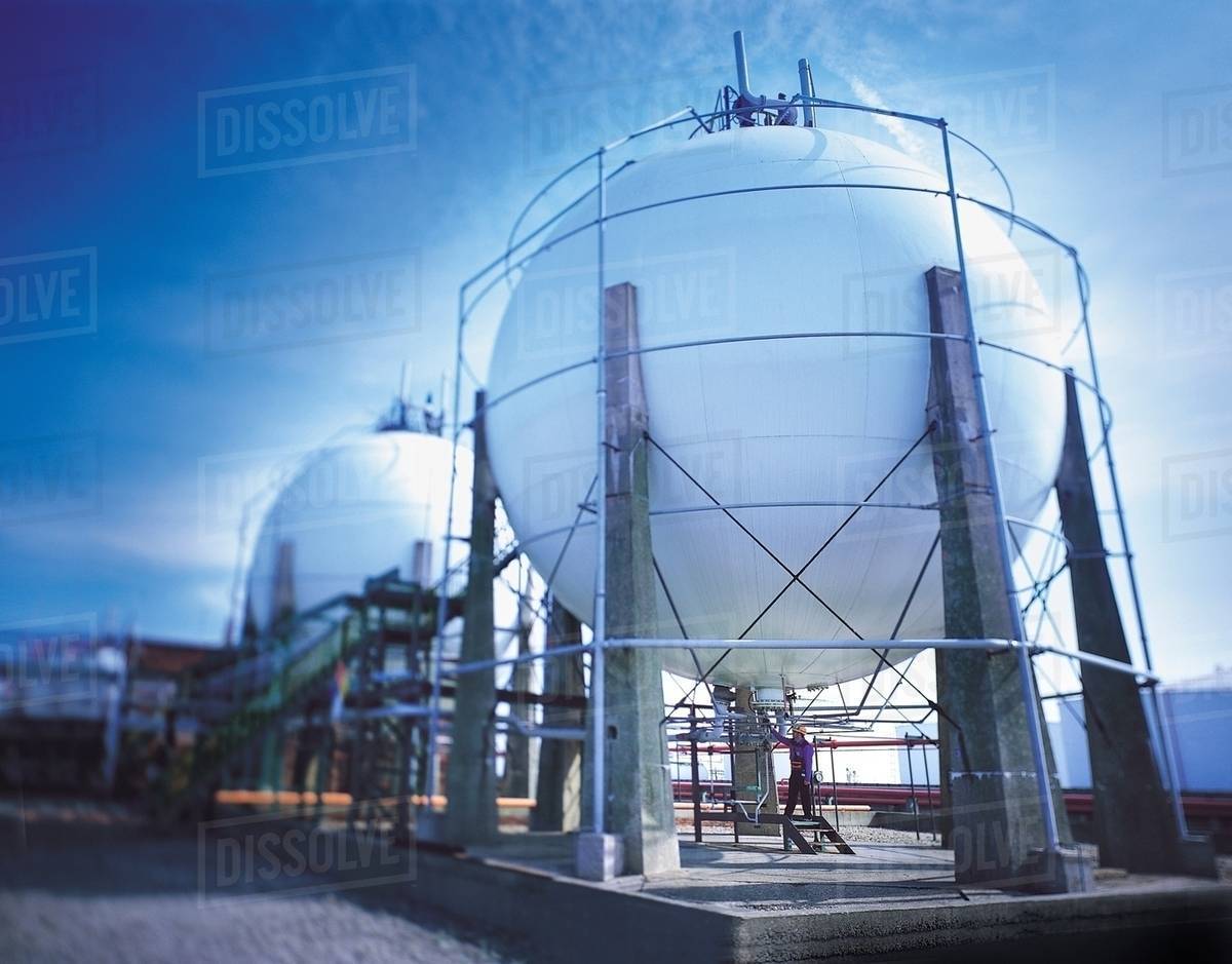 Gas storage sphere in port - Stock Photo - Dissolve