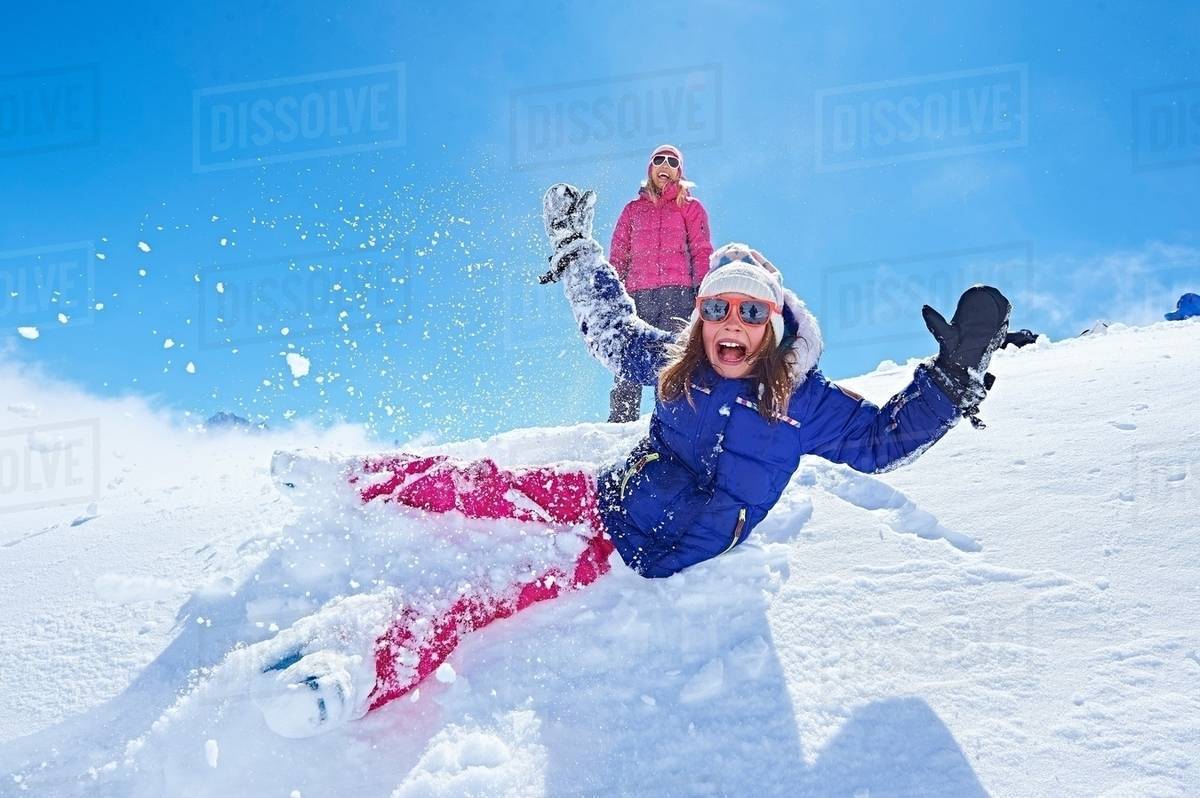 Girl falling into snow, Chamonix, France - Royalty-free Stock Photo ...