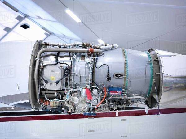 Jet engine in an aircraft hangar - Stock Photo - Dissolve