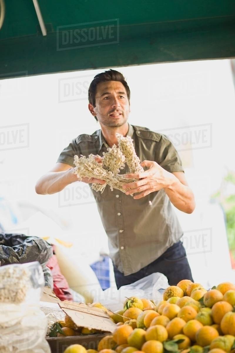 Man selling fruits - Stock Photo - Dissolve
