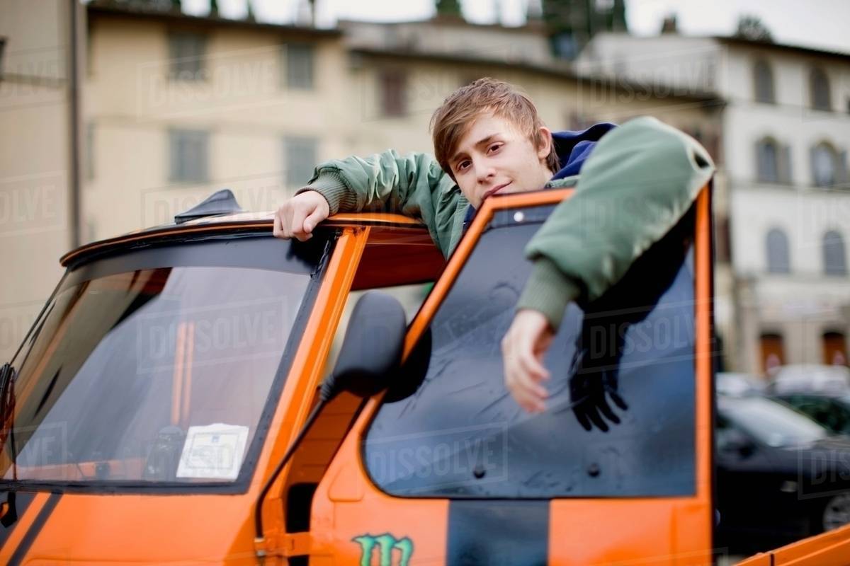 Boy with flossy moped - Royalty-free Stock Photo | Dissolve