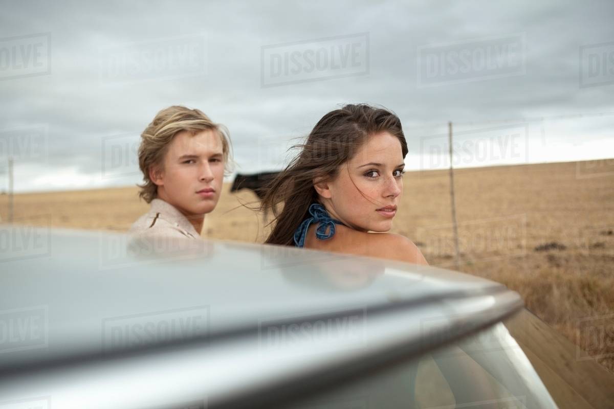 Couple looking back - Stock Photo - Dissolve